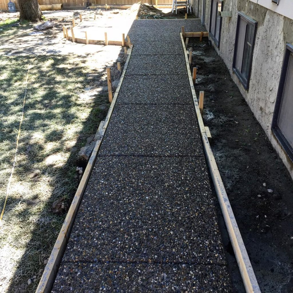 Advantages of Installing a Concrete Walkway in Your Landscape